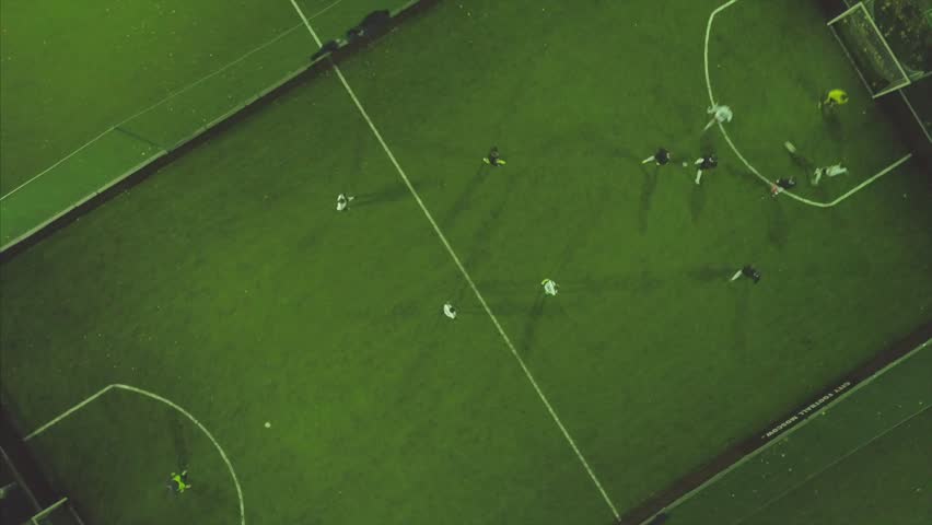 Aerial View Of Football Team Practicing At Day On Soccer Field In Top ...