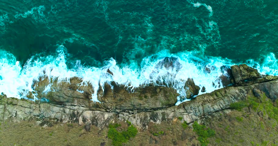 Waves washing over rocks on the shoreline image - Free stock photo ...