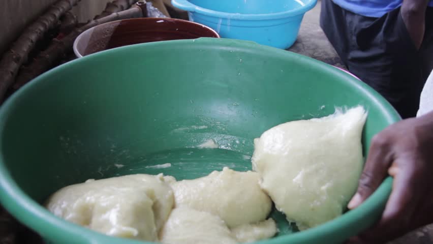 Pounding Fufu- Traditional Ghanian Food. Stock Footage Video (100% ...