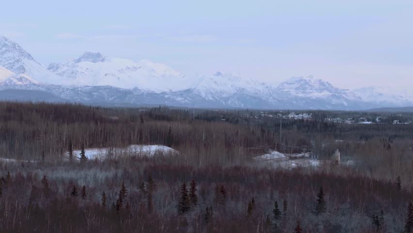 Landscape with snow-capped mountains with ice and water in Alaska image ...