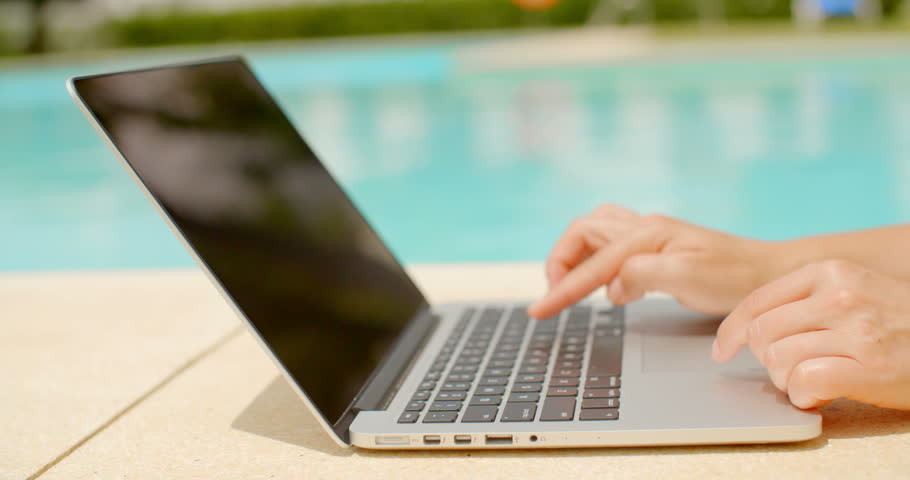 Man Hands Working With Laptop By The Swimming Pool, Stabilized Shot ...