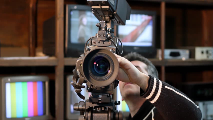 Camera Operator Working With A Cinema Broadcast TV Camera Stock Footage ...