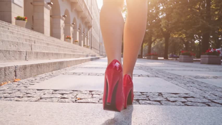 Sexy Woman Legs In Red High Heels Shoes Walking In The City Urban ...