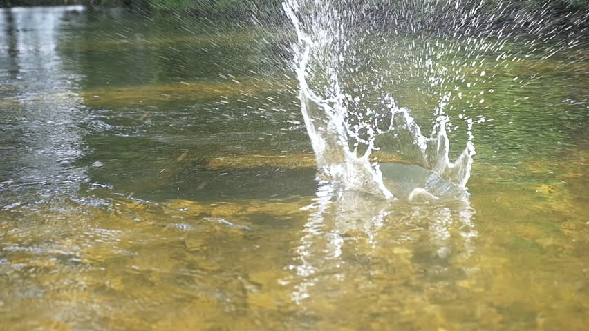 Big Rock Thrown Into River/Stream Huge Splash Slow Motion Stock Footage ...