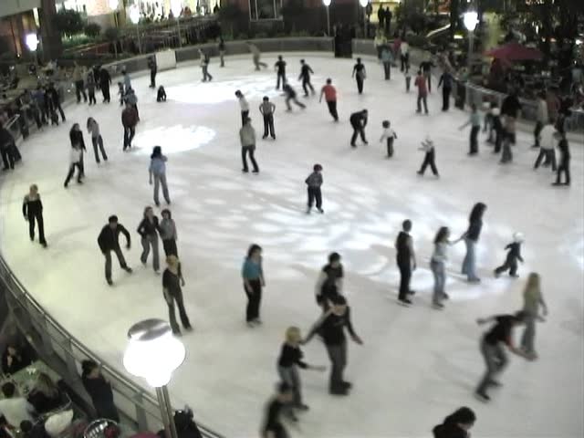 Stock video of people skating on the rink in | 12054 | Shutterstock