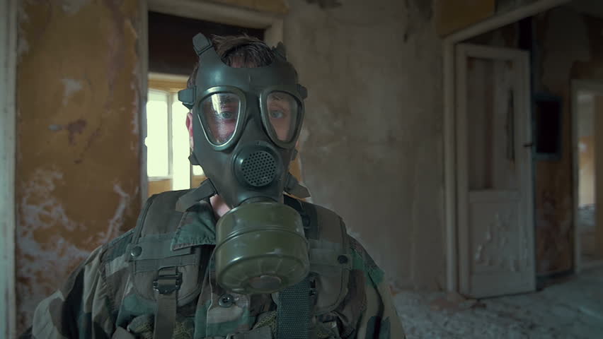 Smoke Rising Behind A Man In A Gas Mask Stock Footage Video 309907 ...