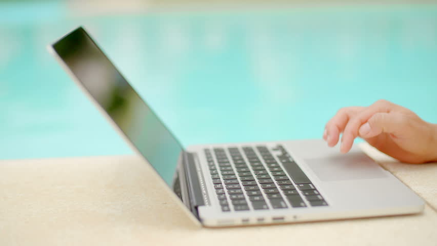 Man Hands Working With Laptop By The Swimming Pool, Stabilized Shot ...
