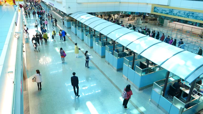TAIPEI, TAIWAN - FEBRUARY 18, 2015: People Queue In Front Of Passport ...