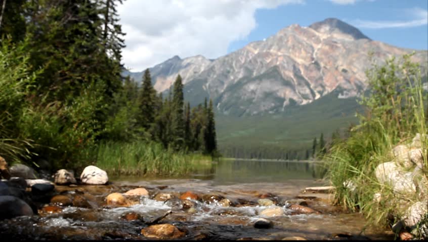 Scenic River Landscape and mountains in Jasper National Park, Alberta ...
