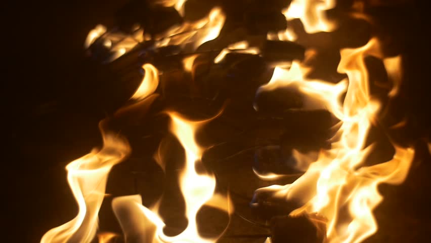 Fire Torch Is Burning, Slow Motion, Male Hand Appears And Puts A Few ...