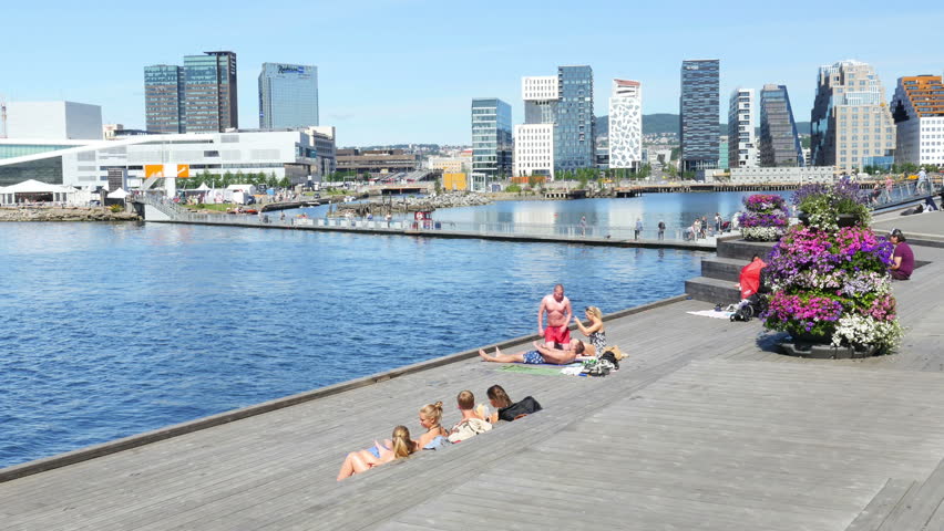 OSLO - NORWAY, AUGUST 2015: People Sunbathing Swimming Opera House ...
