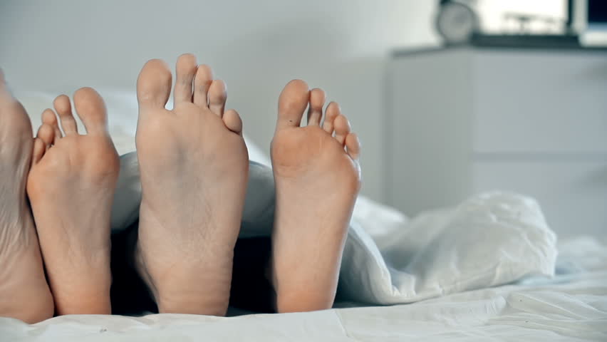 Feet of Loving Couple Lying Stock Footage Video (100% Royalty-free ...
