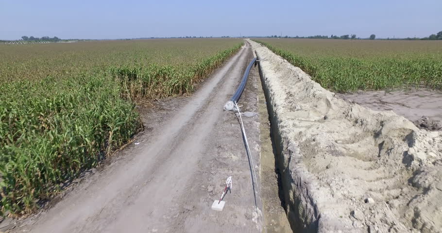 Aerial Over Cultivated Agricultural Corn Field Width Water Pump And ...