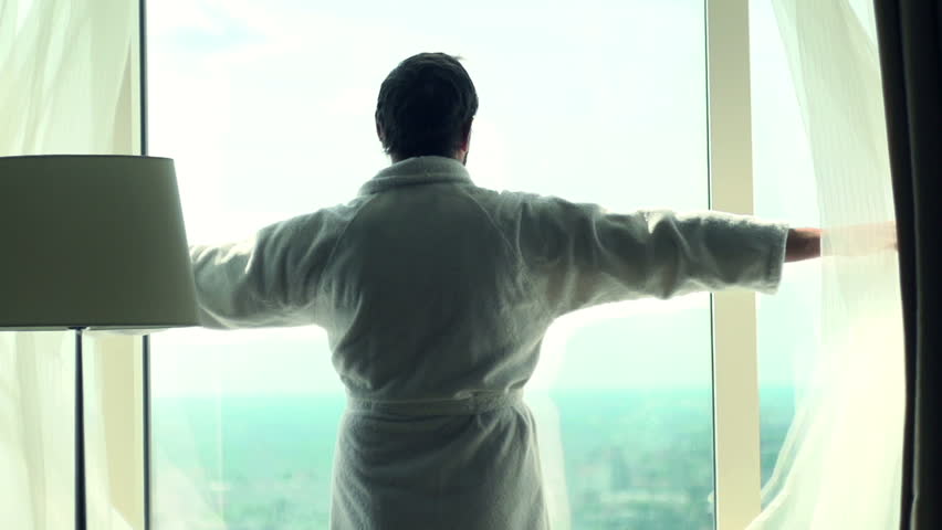 Man Watching Through Window. Person Silhouette Alone Sitting On Chair ...