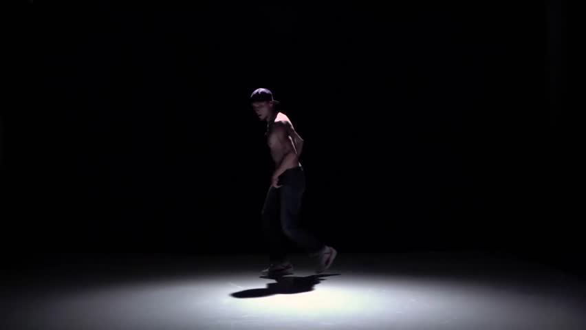 Dancer In Blue Trousers Starts Dancing Breakdance, On Black, Shadow ...