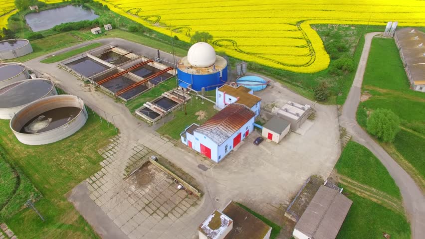 Camera Flight Over Biogas Plant From Pig Farm In Green Fields ...