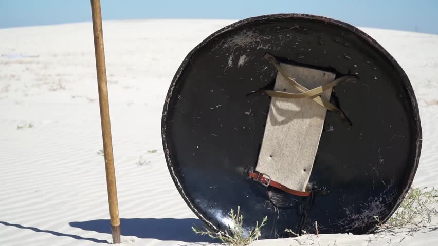 Stock video of stuck in the sand shield and | 19900984 | Shutterstock