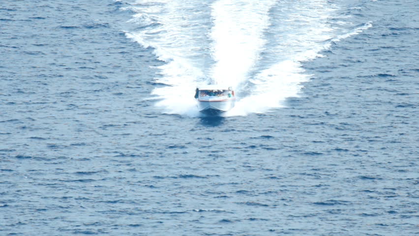 PHAN NGA, THAILAND - NOVEMBER 23, 2015: Two Men Swimming Near Speedboat ...