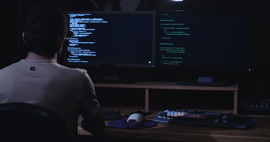 Computer Hacker Sitting in a Stock Footage Video (100% Royalty-free ...