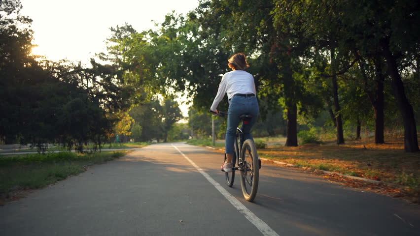 Back View Woman Riding a Stock Footage Video (100% Royalty-free ...
