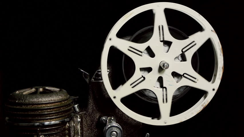 Stock Video Clip of Movie Projector Reel Turning (HD). Vintage 8mm ...