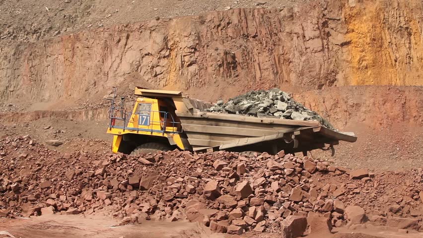 Big Yellow Truck In A Career Of Iron Ore Mining, Delivery By The Motor ...