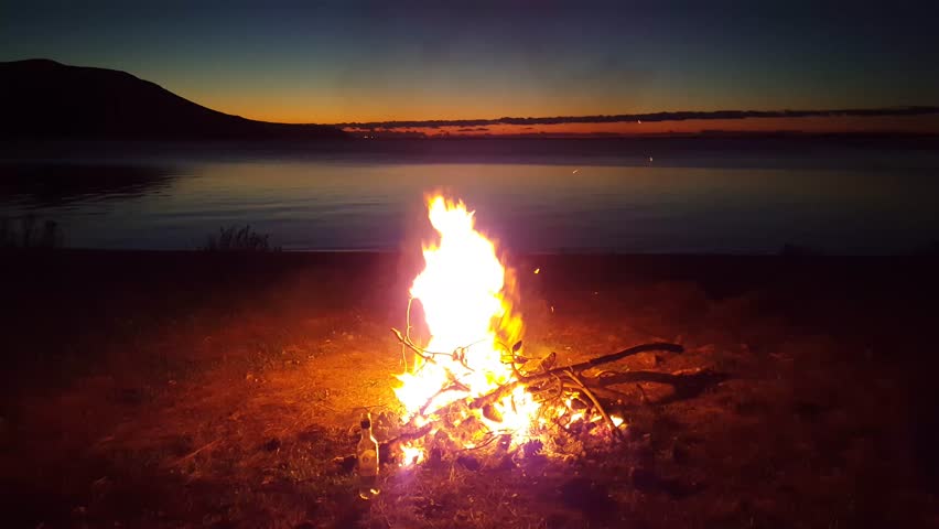 Stock video of campfire with a empty bottle at | 22993384 | Shutterstock