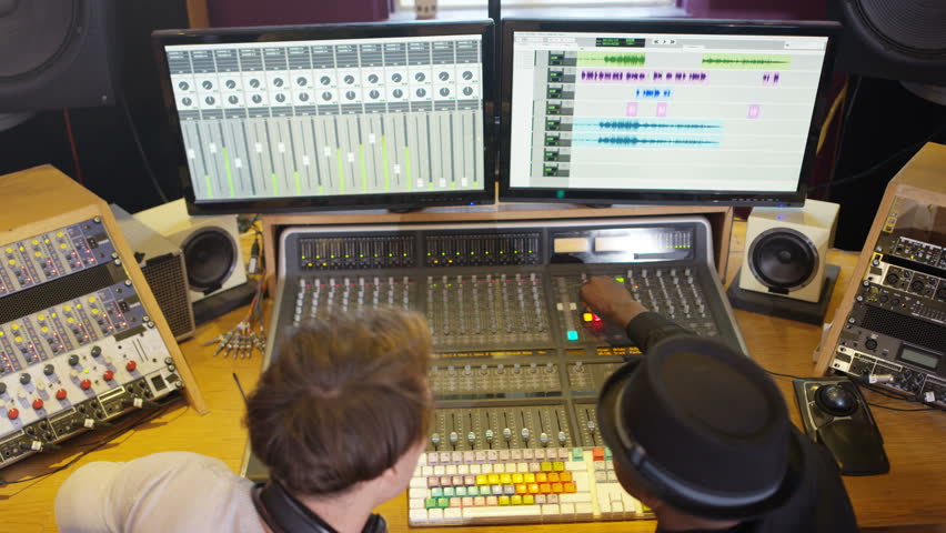 4K Music Producer & Sound Engineer Working Together In Recording Studio ...