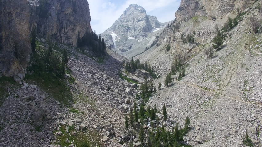 Aerial Footage. Flying Over A Mountain Ridge And Narrow Valley. 4K ...