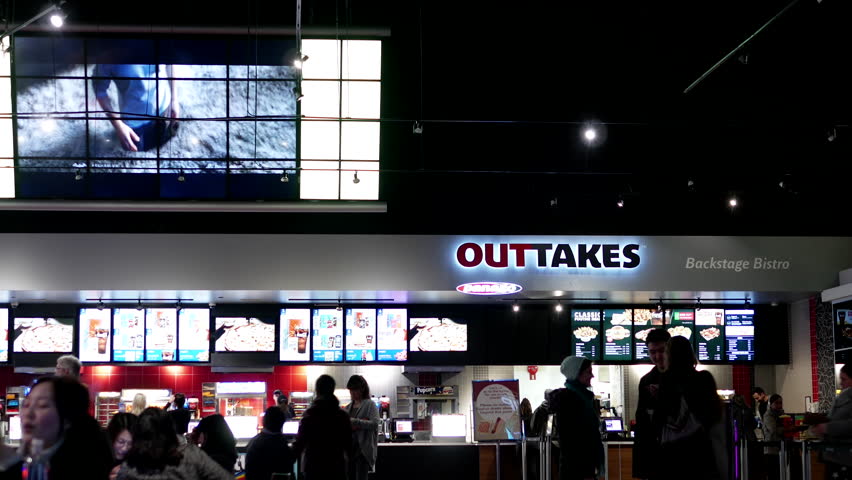 Coquitlam, BC, Canada - February 21, 2017 : People Buying Movie Ticket ...
