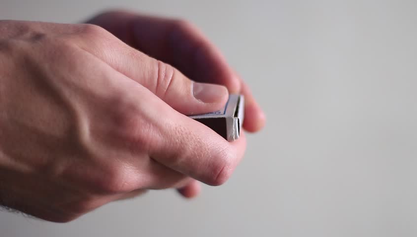 Hand Holding And Moving A Computer Mouse Against A White Background ...