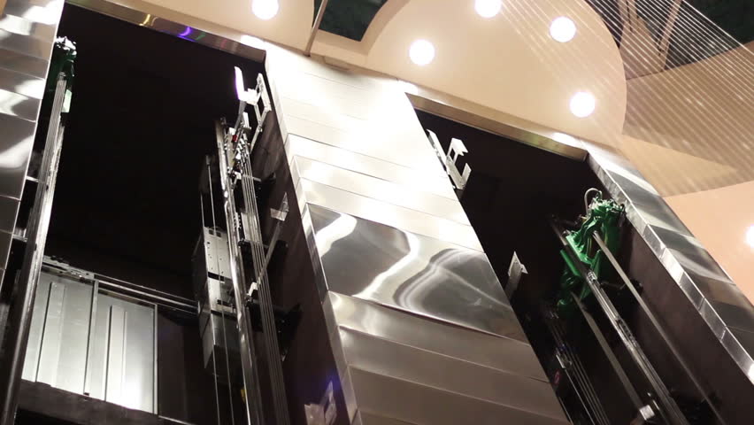 Video Of Modern Elevator Moving Down Several Floors With Transparent ...