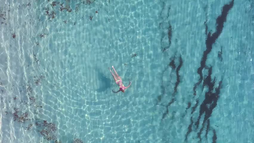 Aerial View. Young Woman Floating Stock Footage Video (100% Royalty ...