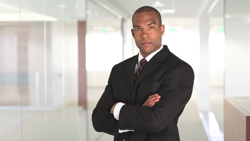 Stock video of portrait of executive standing and uncrossing | 2760314 ...