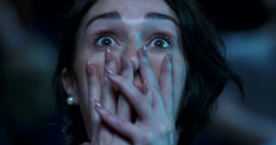 Scared And Surprised Girl Watching Scary Horror Movie In Tv, Shot In ...