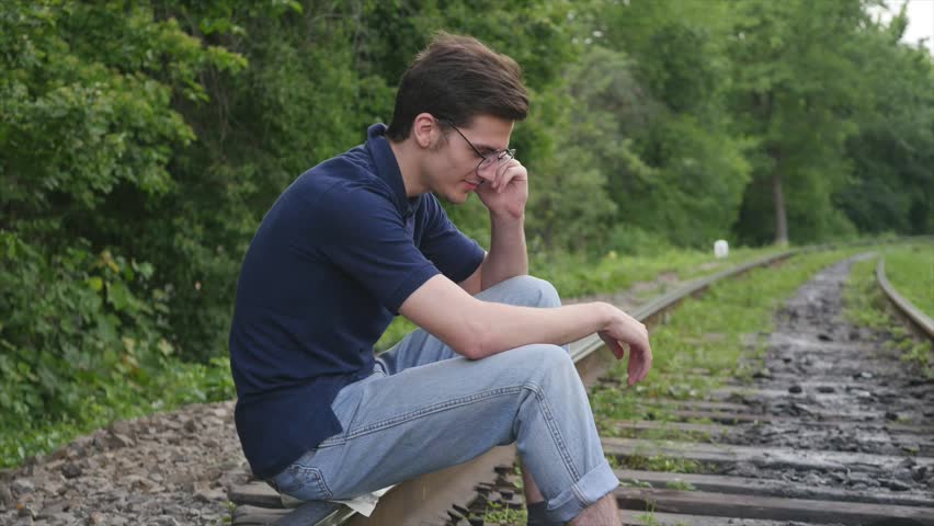 Sad, Depressed Boy Sitting On The Swing, Slow Motion Shot At 240fps ...