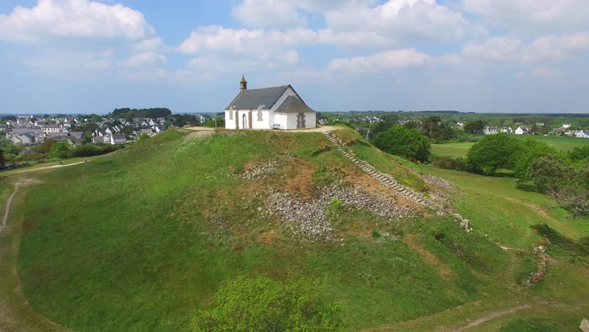 Flying Over The Tumulus St Michel And Its Chapel Located In Carnac, A ...