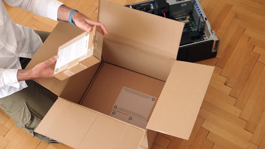 LONDON, UNITED KINGDOM - CIRCA 2017: Computer Geek Unboxing Unpacking ...