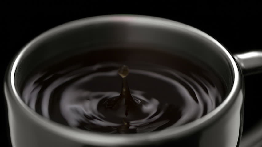 Coffee Drop Making Ripple in Stock Footage Video (100% Royalty-free ...