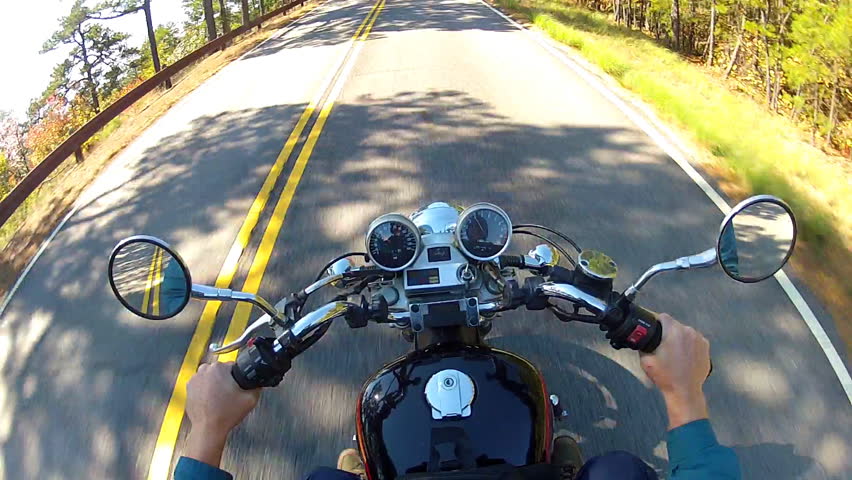 A Wide Angle Shot Of The Point Of View Of Someone Riding A Motorcycle ...