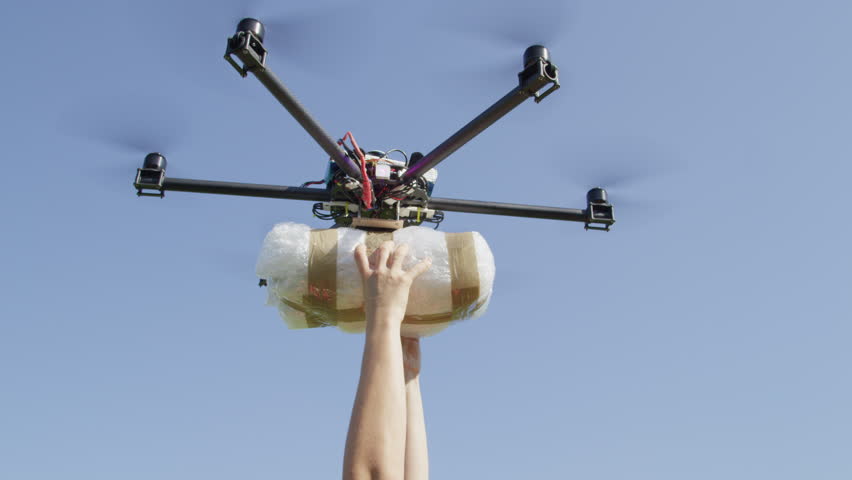 CLOSE UP: Drone Delivery Of Illegal Drugs. UAV Aircraft Flying Drug ...