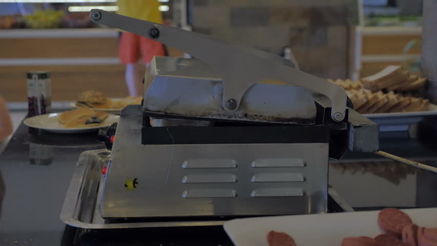 People Make A Toast In The Toaster In The Hotel Restaurant. Buffet ...