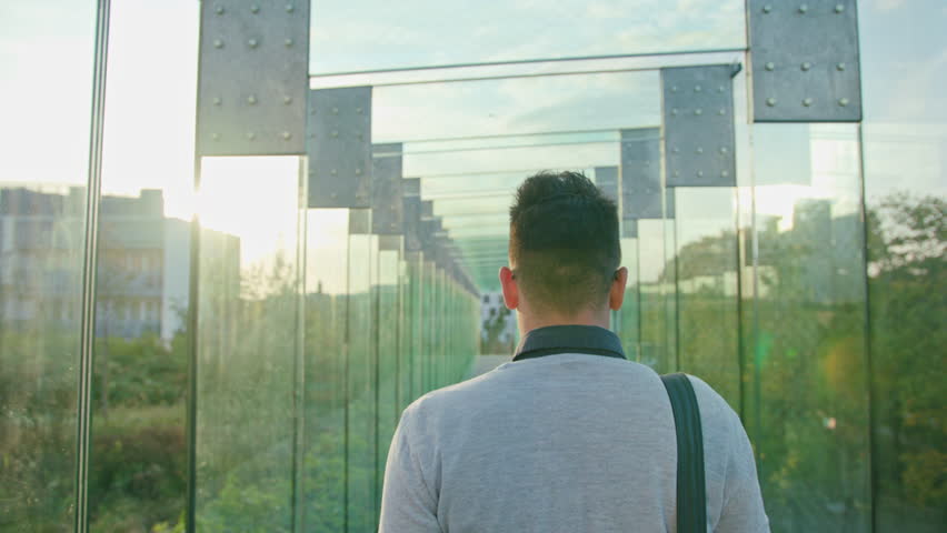 Man Looking Out Window Watching Heavy Wind And Rain During Storm. Stock ...