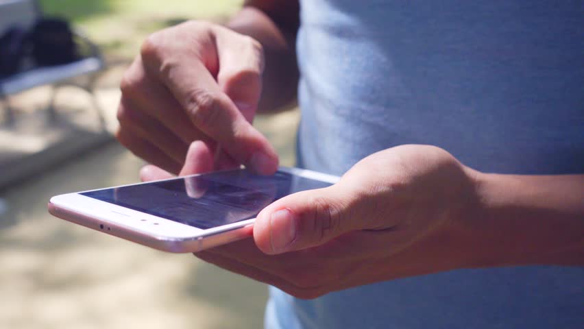 Close Up Of Woman Hands Using A Smart Phone Searching Content On The ...