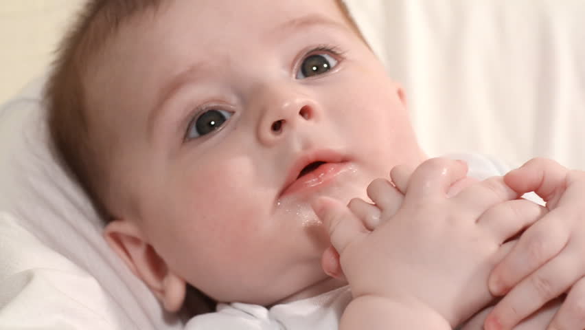 Close Up Of A Happy Three Month Old, Asian Baby Girl Wriggling Around ...