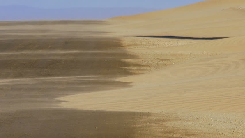 Strong Wind Moving Sand Through Stock Footage Video (100% Royalty-free ...
