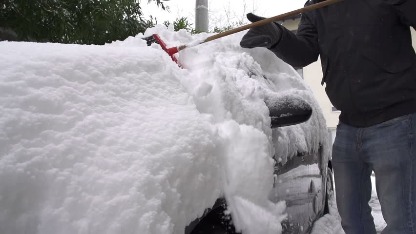 Slow Motion: Removing Snow from Stock Footage Video (100% Royalty-free ...