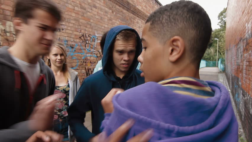 School Bullying - A Group Of Elementary School Girls Pick On One Girl ...
