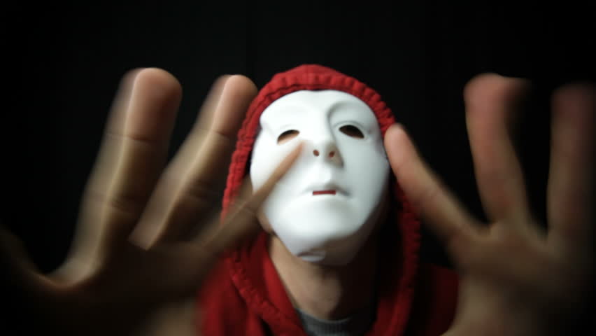 Stock video of mad masked man over dark background | 3911984 | Shutterstock