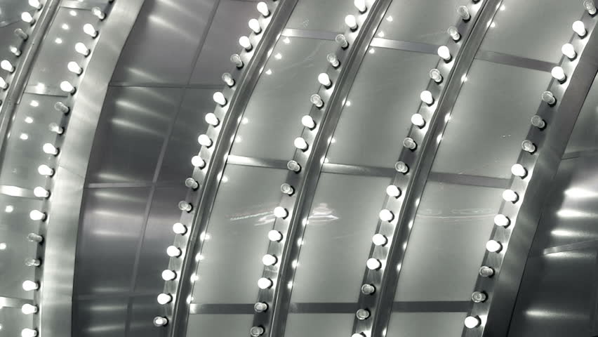 Stock Video Clip of Abstract Silver Chasing Light Marquee Close Up ...